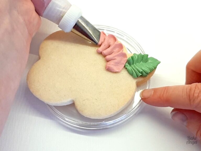 How to Pipe a Royal Icing Flower Sugar Cookie - Bake Angel