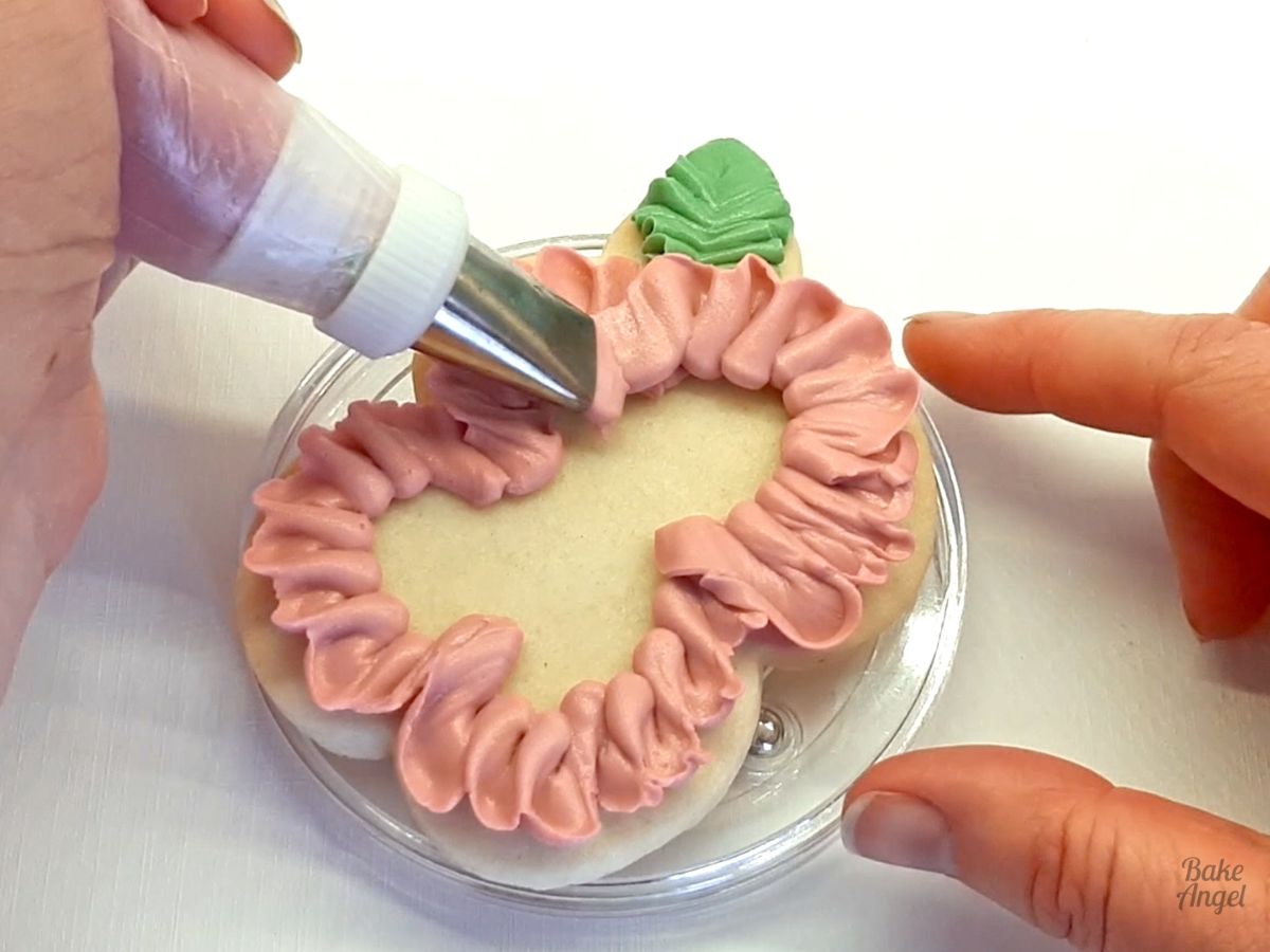 How to Pipe a Royal Icing Flower Sugar Cookie - Bake Angel